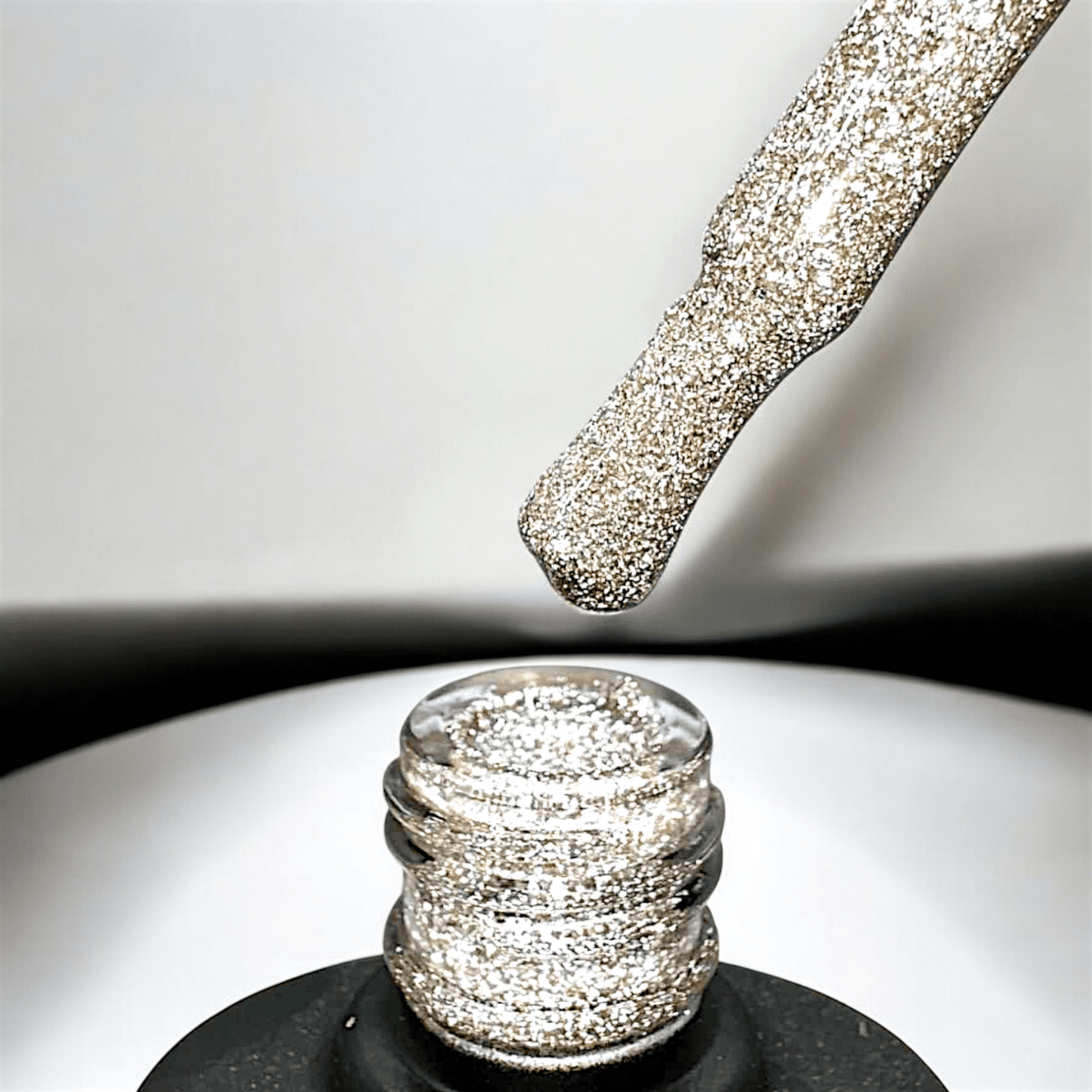 Sparkling gold with a reflective shimmer.