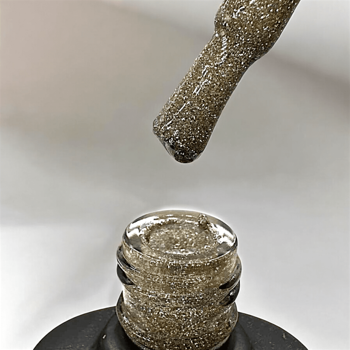 Sparkling gold with a reflective shimmer.